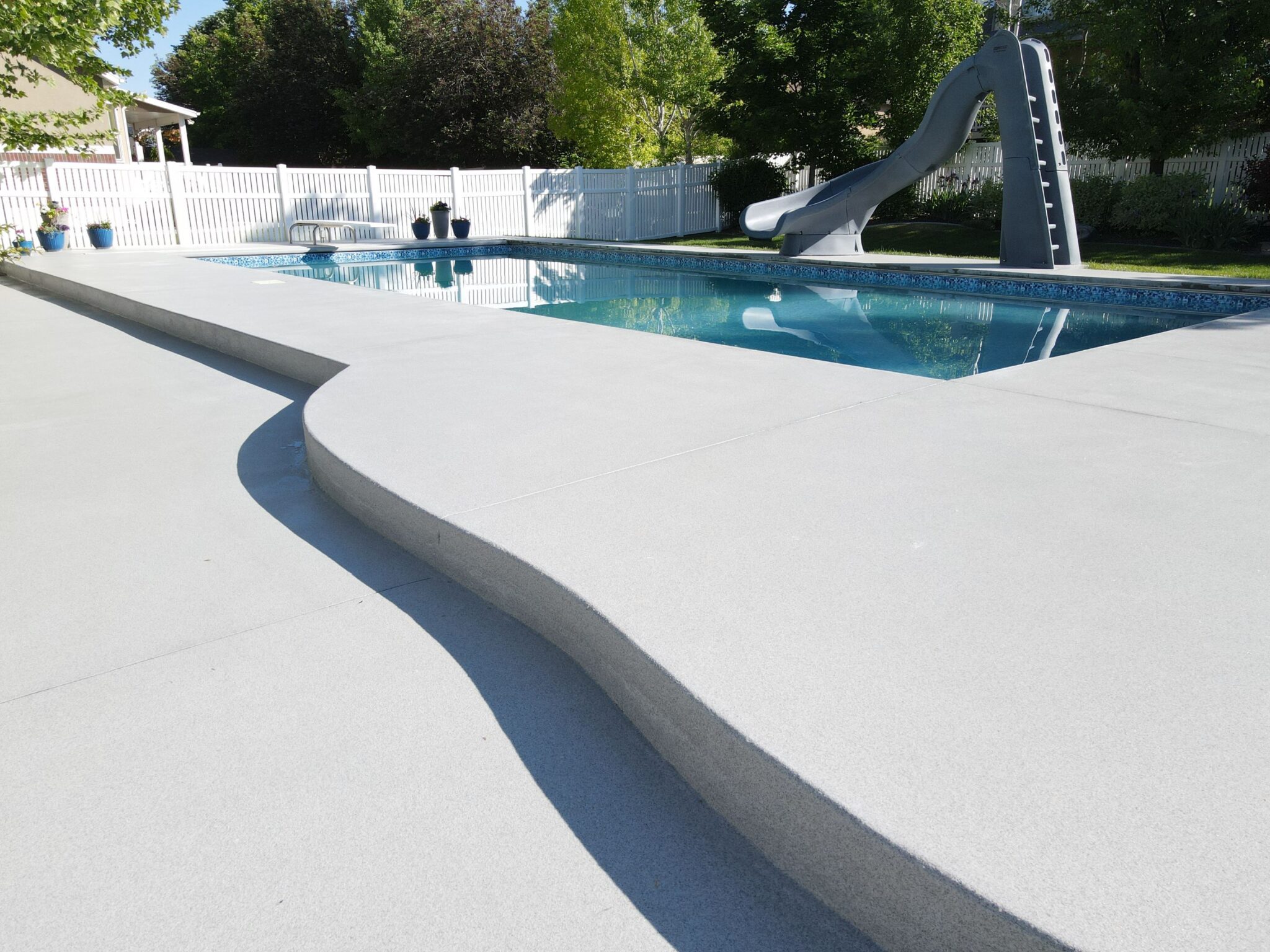 Chestnut Quartz Pool Deck In Pleasant View, Utah | Solid Garage Floor ...
