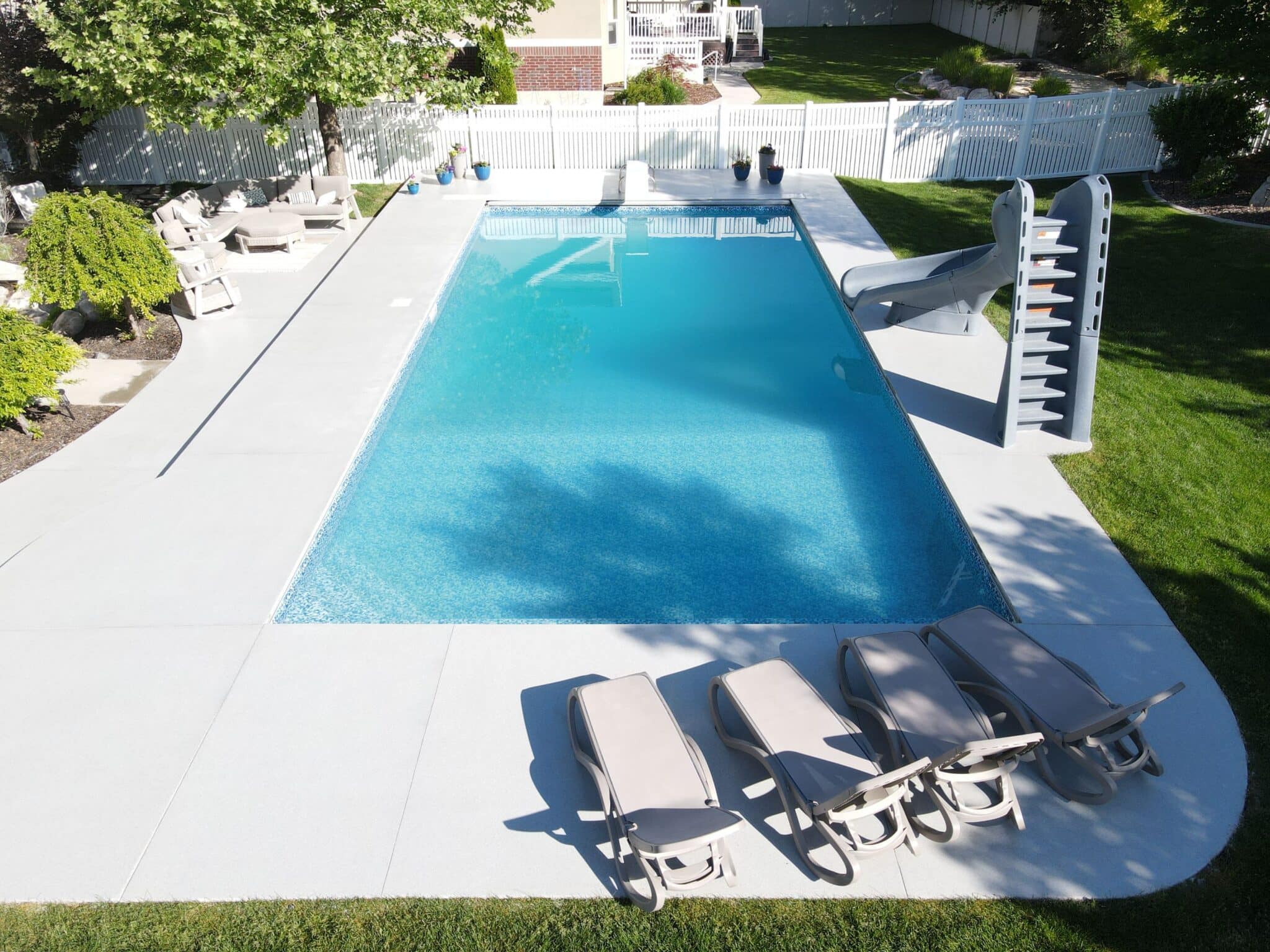 Chestnut Quartz Pool Deck In Pleasant View, Utah | Solid Garage Floor ...